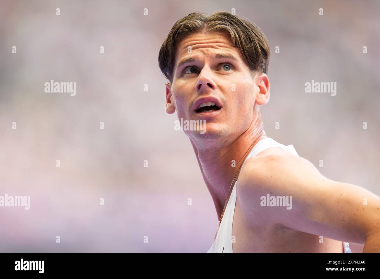 Jonas Raess, of Switzerland, reacts following his men's 5000-meter heat ...