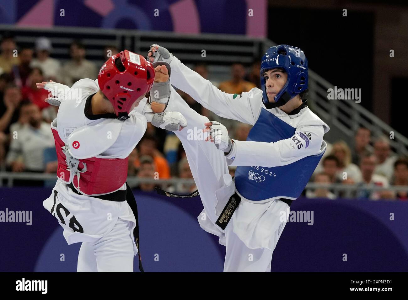 Palestine's Omar Yaser Ismail, right, competes with Spain's Adrian ...