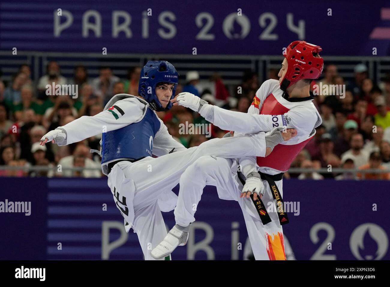 Palestine's Omar Yaser Ismail, left, competes with Spain's Adrian ...