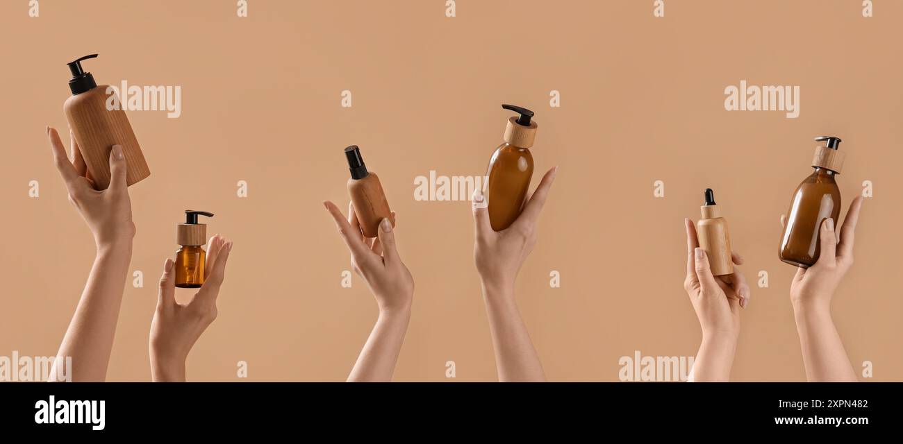 Hands holding different cosmetic products on beige background Stock ...