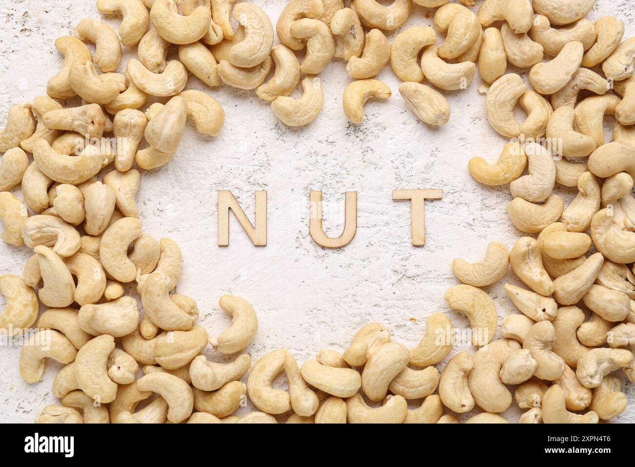 Frame made of cashew and word NUT on light background Stock Photo - Alamy