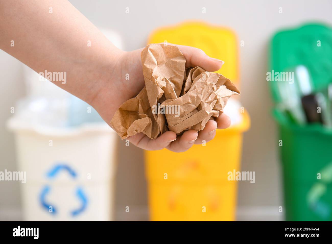 Woman throwing garbage into trash bin, closeup. Recycling concept Stock ...