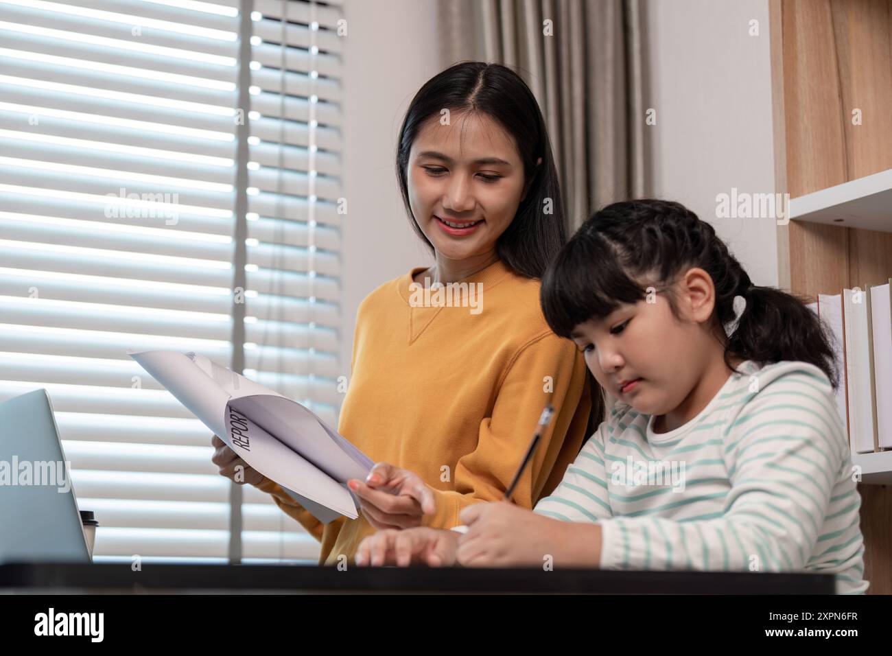 Homework child happy home interior desk hi-res stock photography and ...