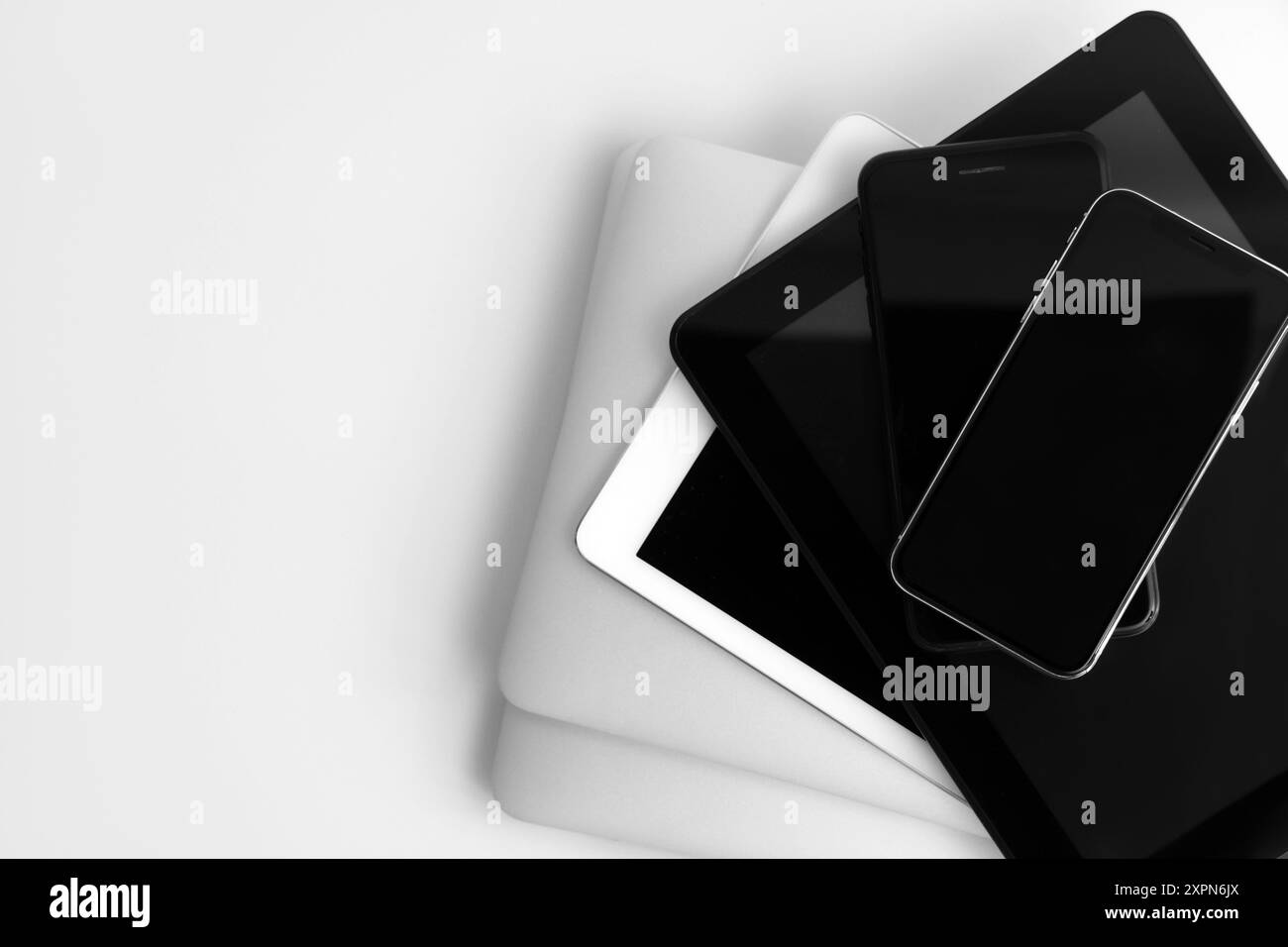 Stack on modern gadgets Black and White Stock Photos & Images - Alamy