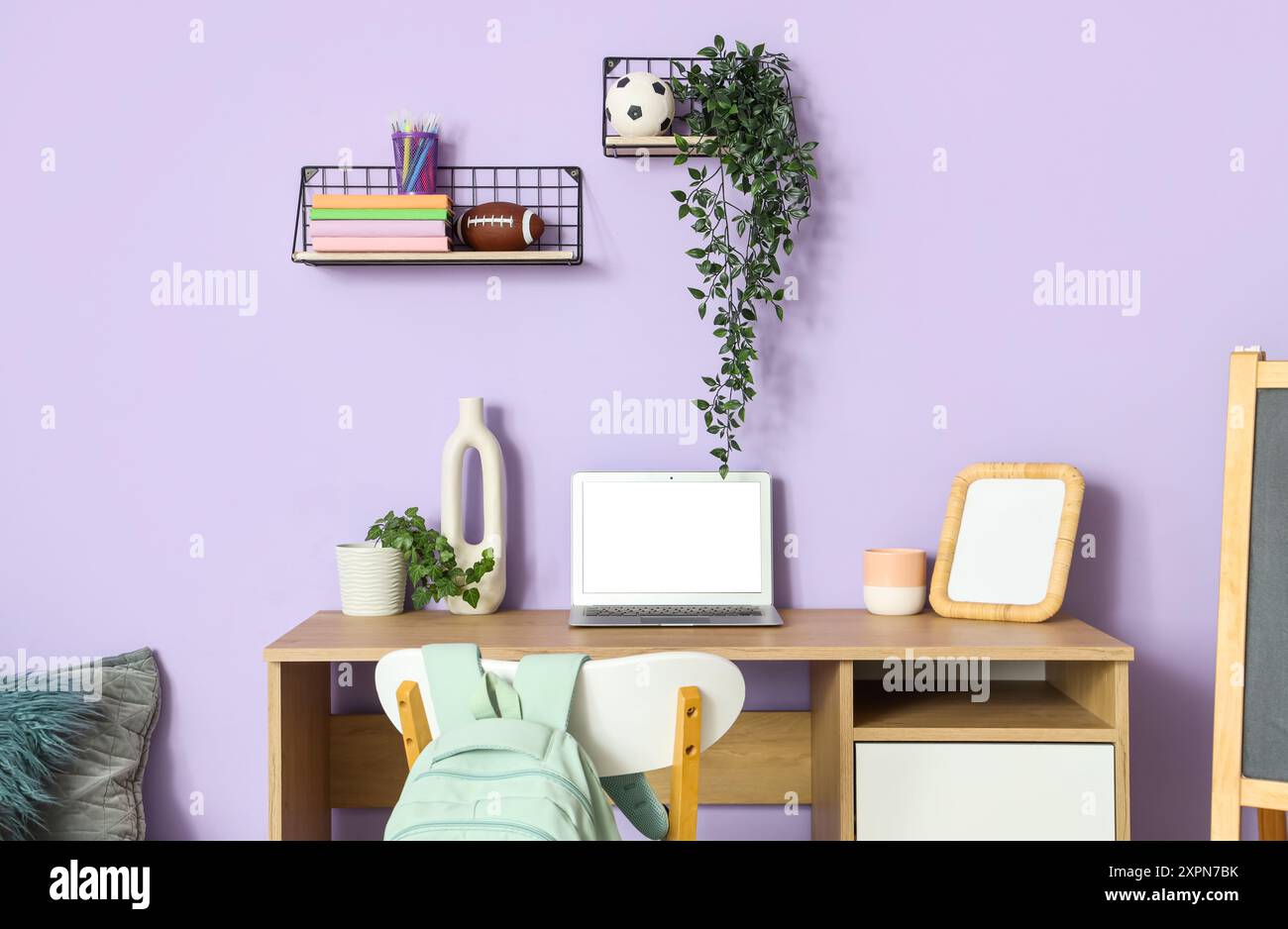 Interior of children's bedroom with study table and shelves Stock Photo ...