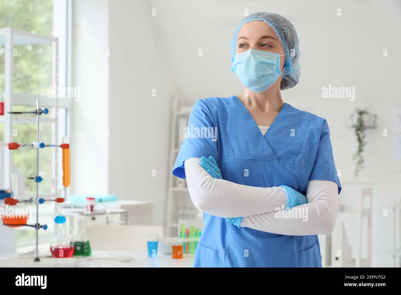 Female chemist in work uniform hi-res stock photography and images - Alamy
