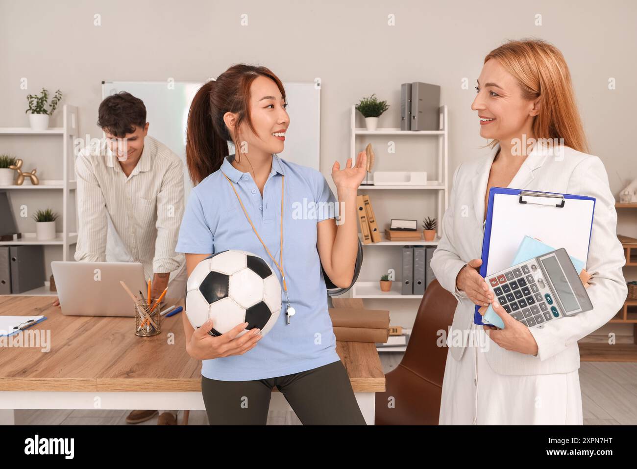 Female teachers talking in hi-res stock photography and images - Alamy
