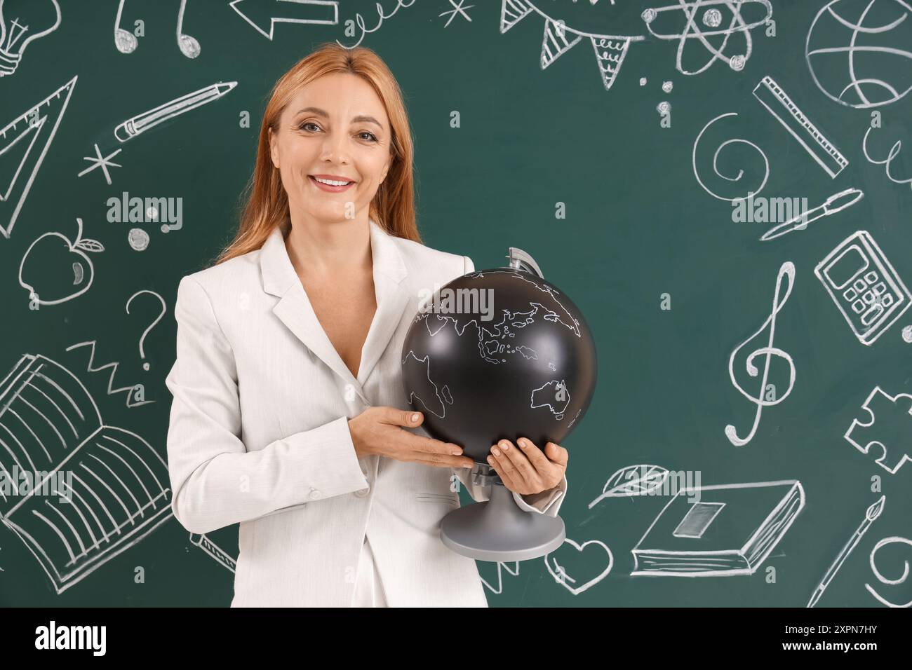 Female teacher in geography hi-res stock photography and images - Alamy