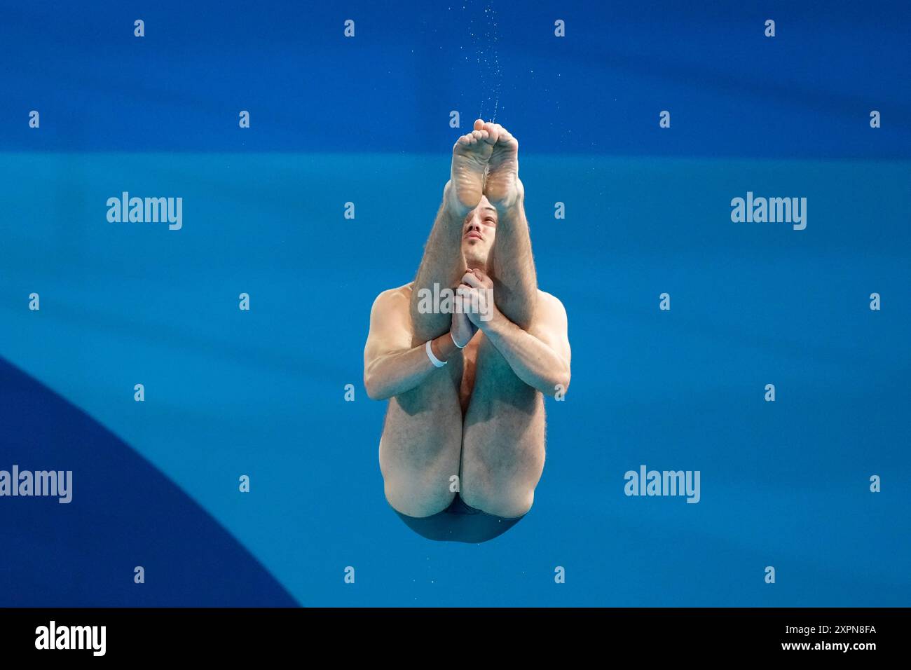 Australia's Kurtis Mathews competes in the men's 3m springboard diving ...