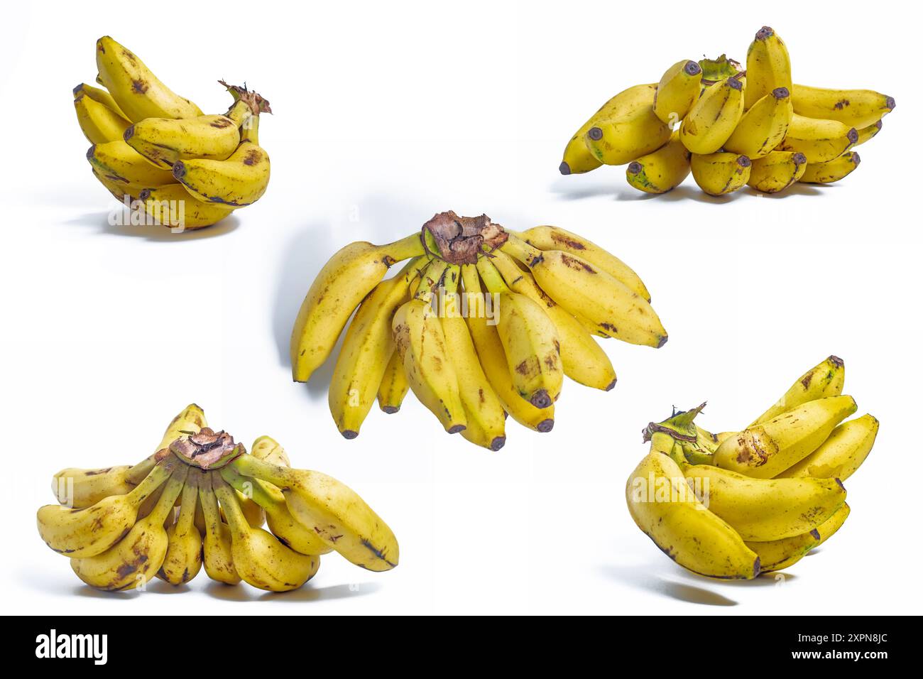 Set of bananas isolated on a white background. Closeup ripe bunch ...