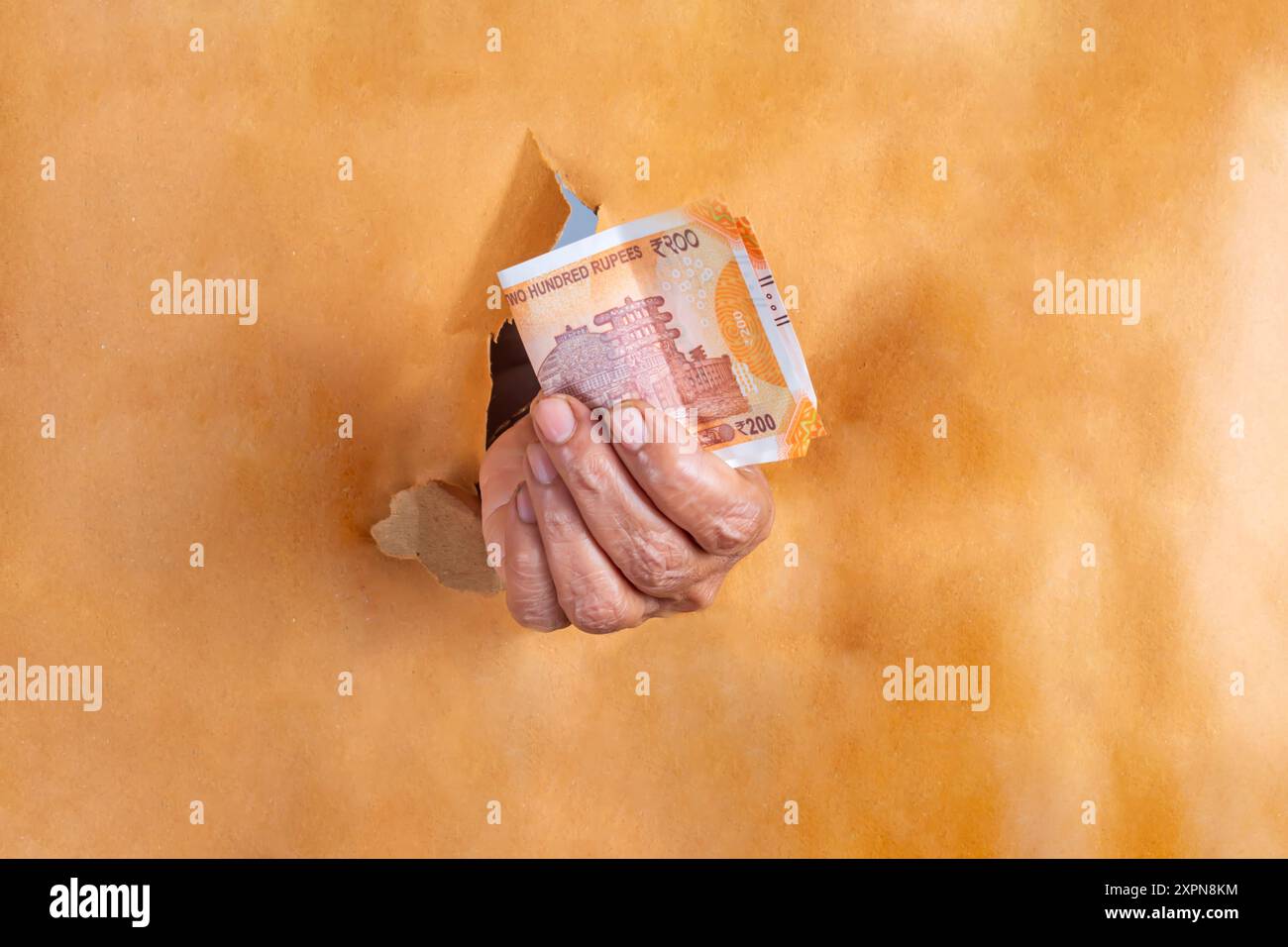 Hands breaking through wall hi-res stock photography and images - Alamy
