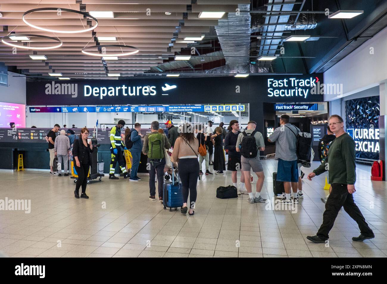 London, UK - July 26, 2024: People walking inside Luton airport ...