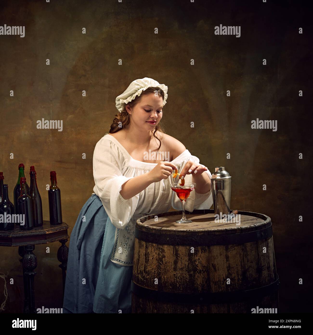 Medieval woman in traditional attire, preparing drink for celebration ...