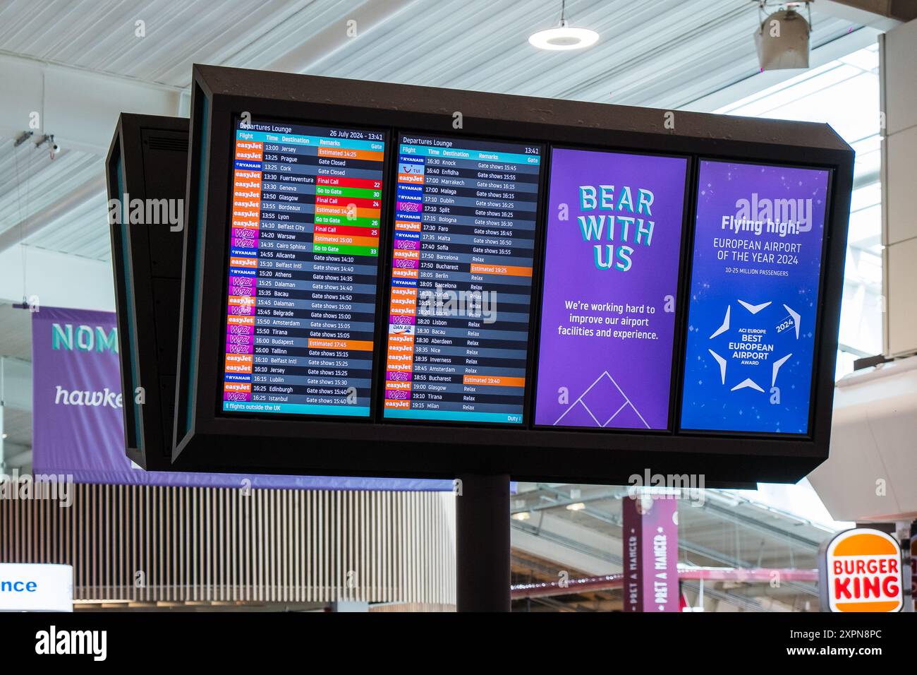 London, UK - July 26, 2024: Flight boarding information screens at ...