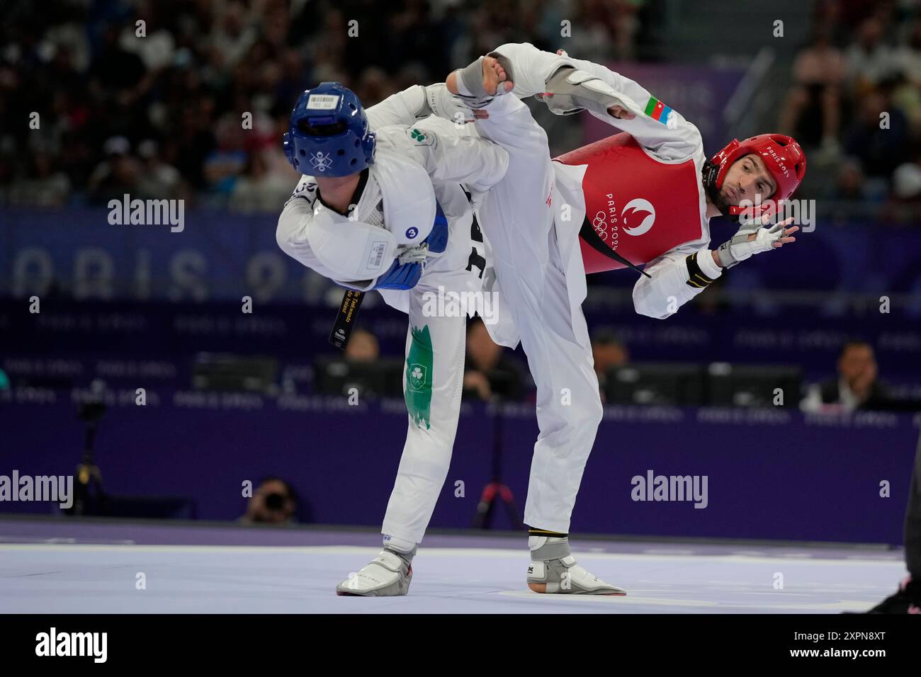 Ireland's Jack Woolley competes with Azerbaijan's Gashim Magomedov in a ...