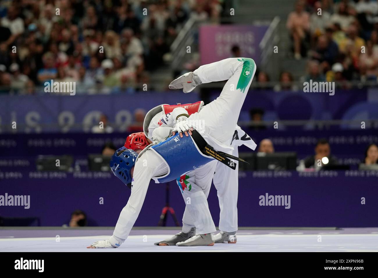 Ireland's Jack Woolley competes with Azerbaijan's Gashim Magomedov in a ...