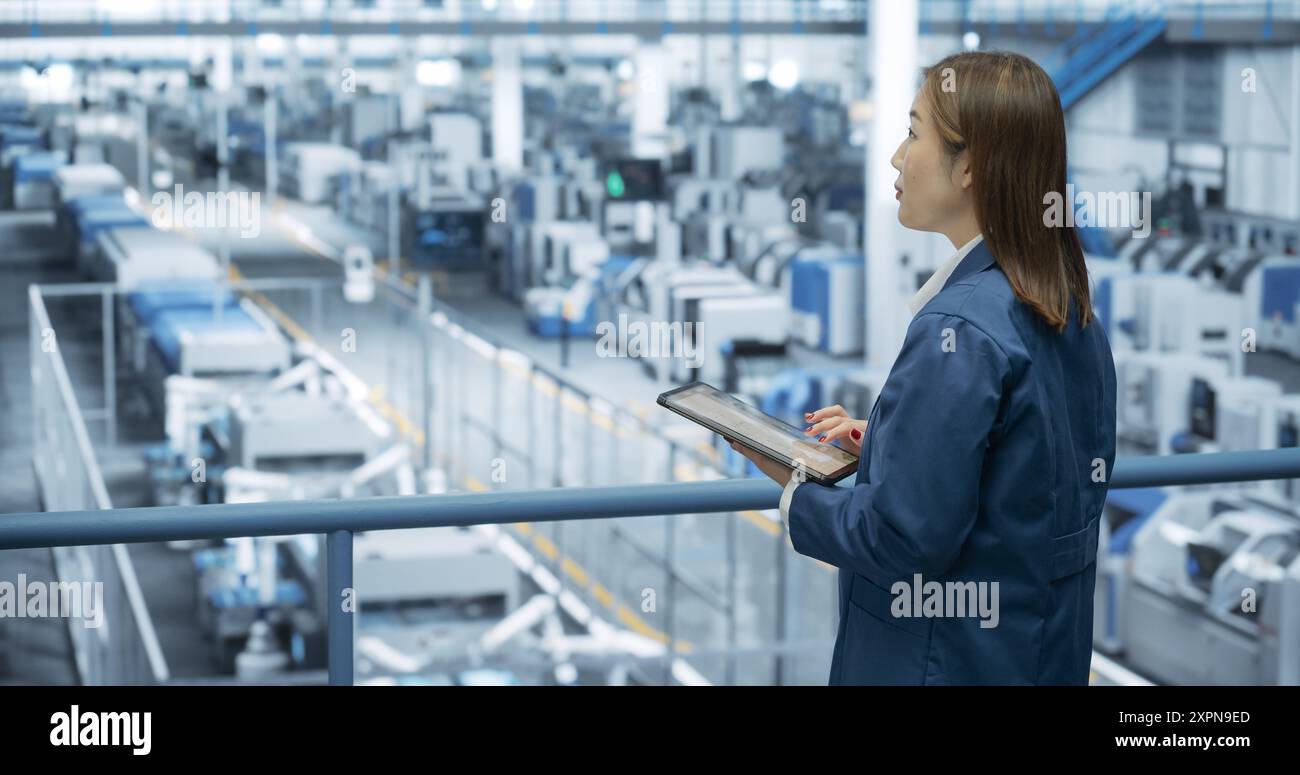 Multiethnic engineer female factory worker hi-res stock photography and ...
