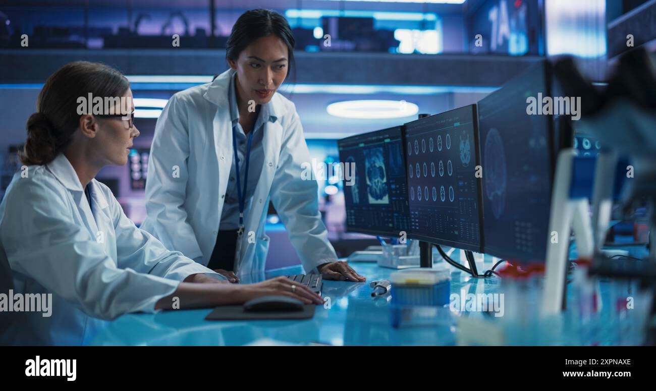 Doctor scientist discussing brain hi-res stock photography and images ...
