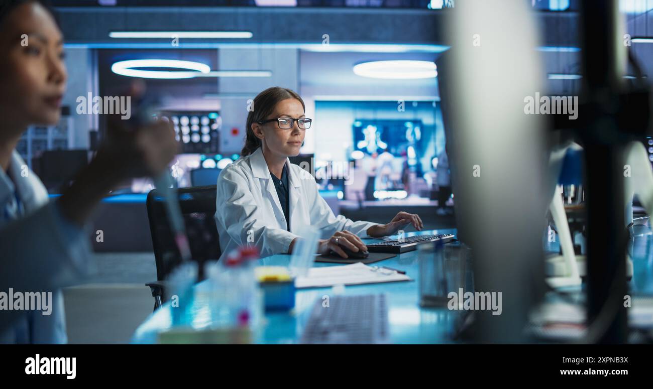 Medical Research Center Laboratory: Caucasian Female Neurologist Using ...
