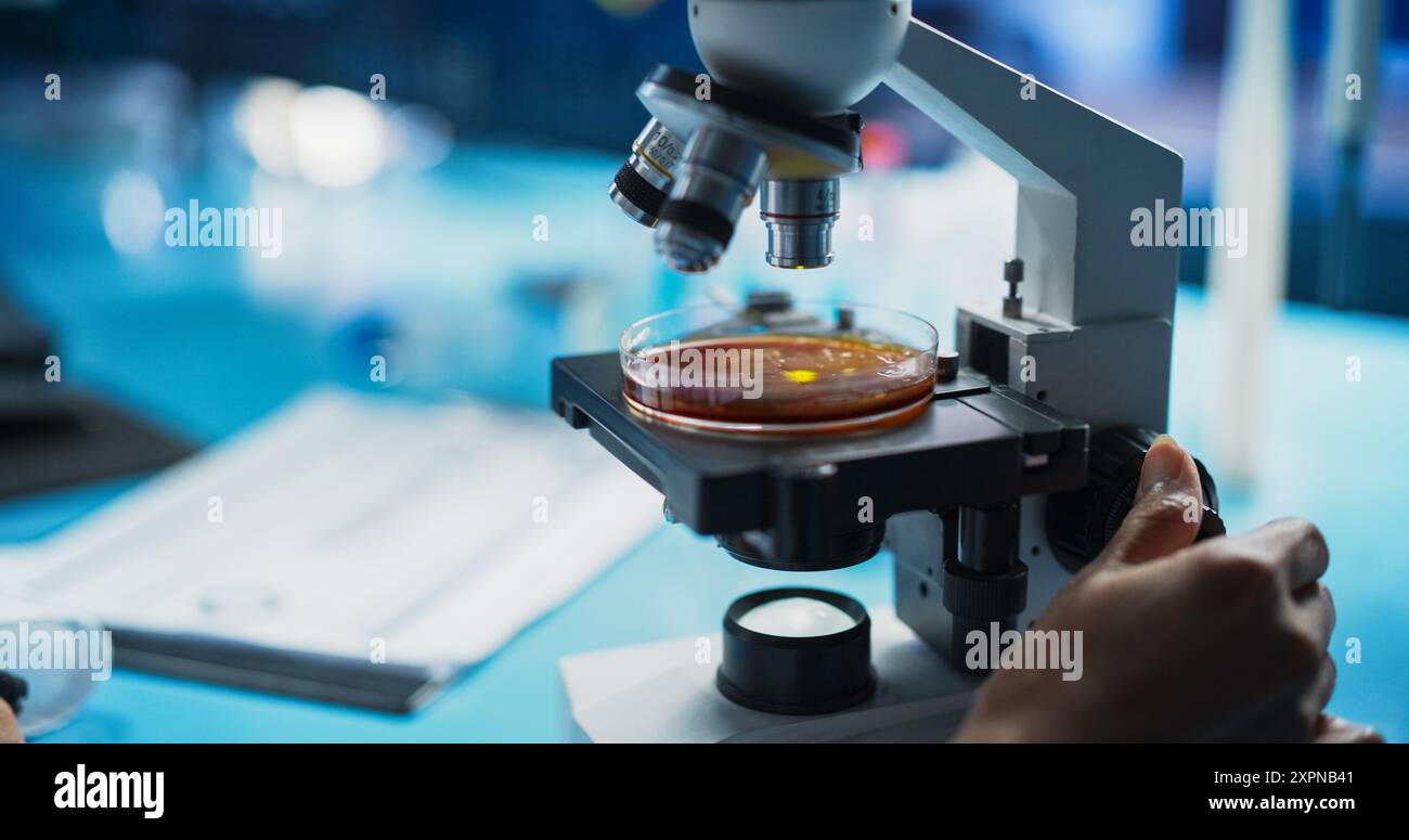Medical Development Laboratory: CLose Up of a Scientist Using ...