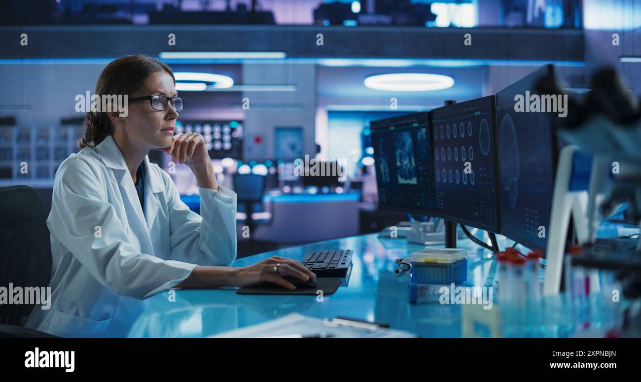 Hospital Research Laboratory: Female Medical Scientist Using Computer ...