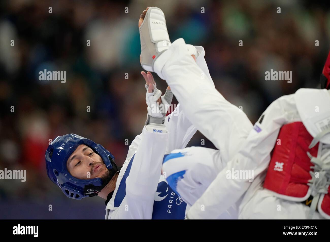 Argentina's Lucas Guzman competes with Hungary's Omar Gergely Salim in ...