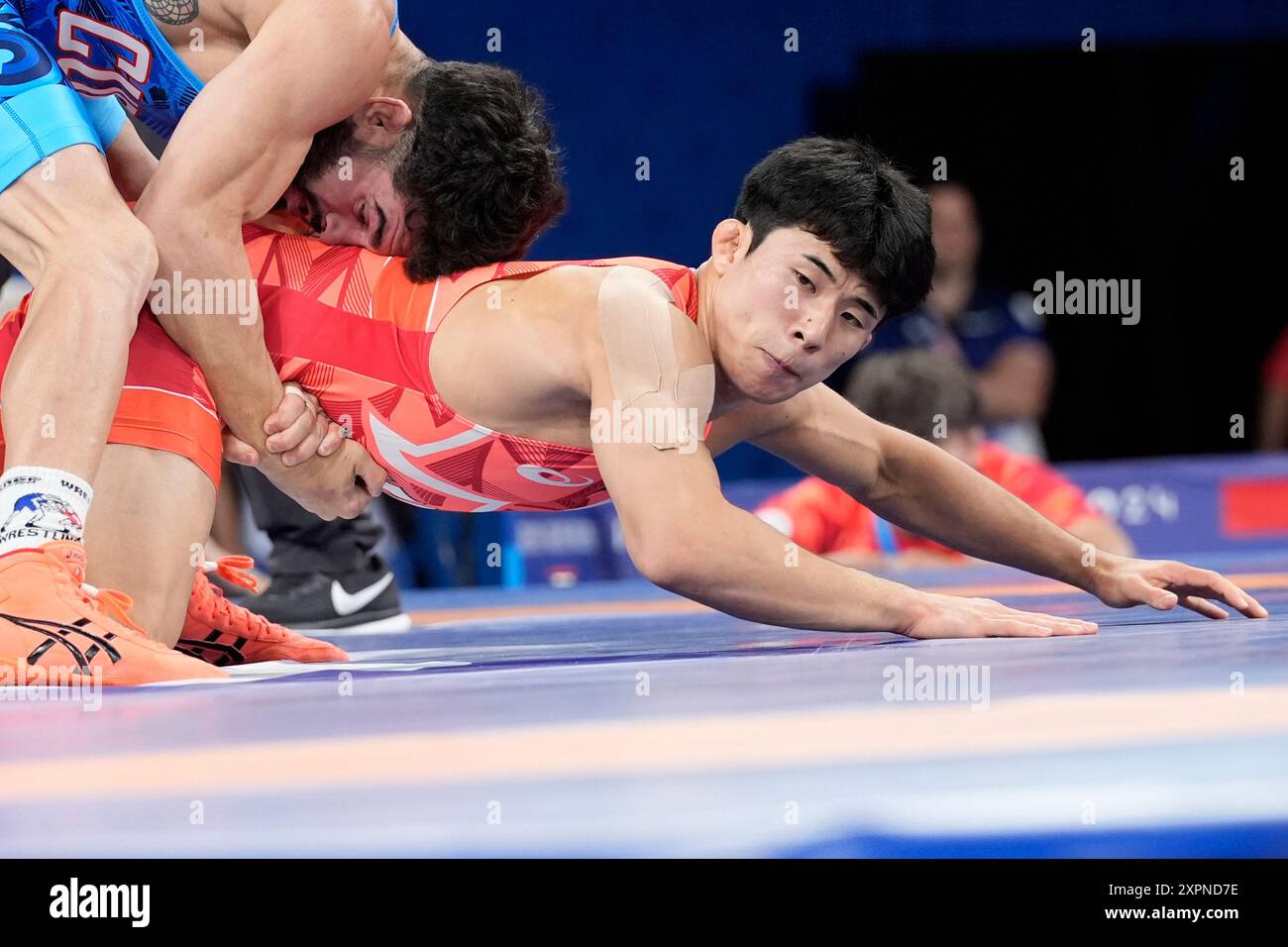 Japan's Kyotaro Sogabe and Cuba's Luis Alberto Orta Sanchez, left ...