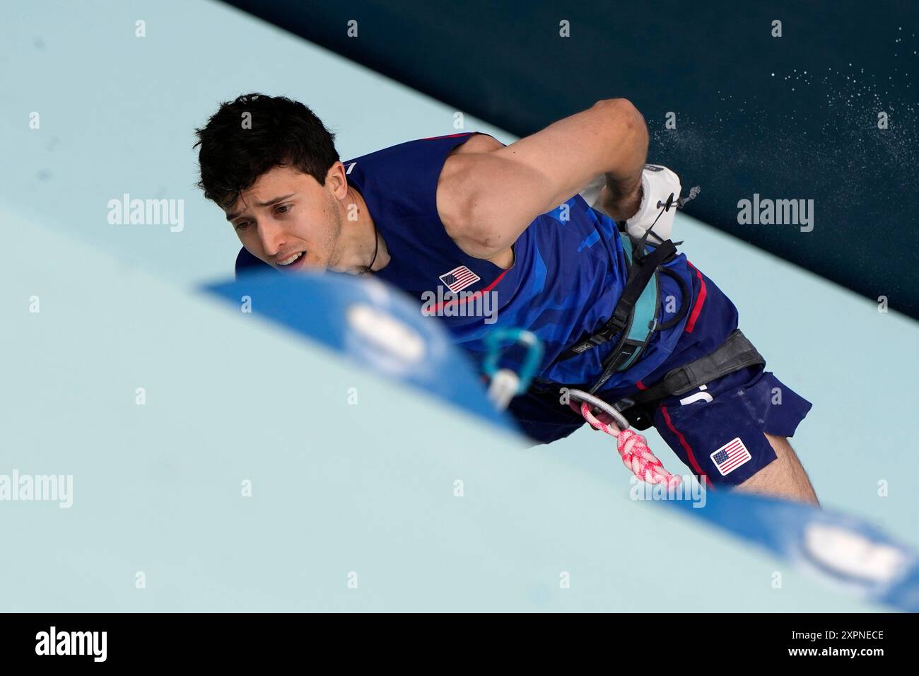 Jesse Grupper of the United States competes in the men's boulder and ...