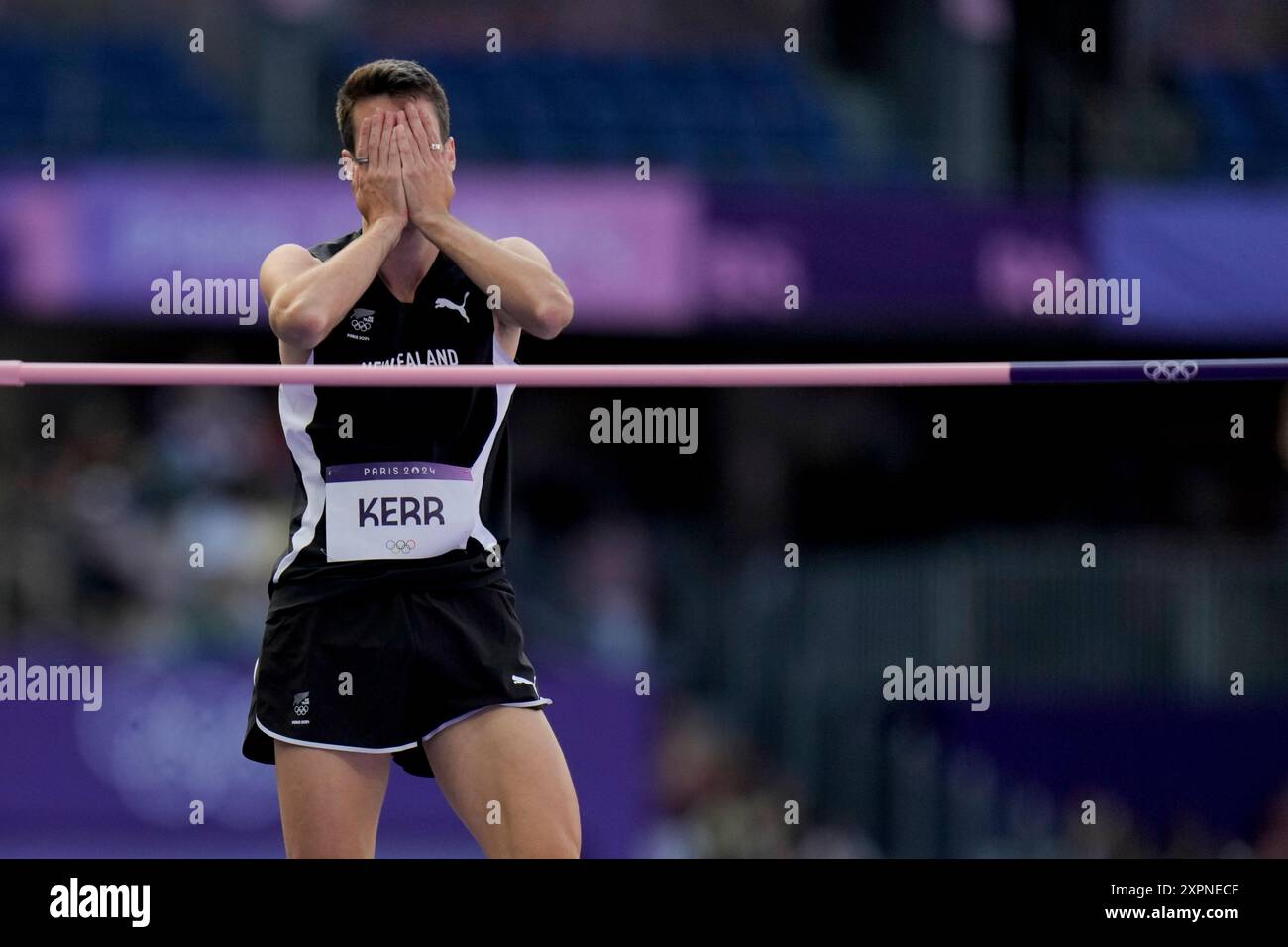 Hamish Kerr, of New Zealand, reacts while competing in the men's high ...