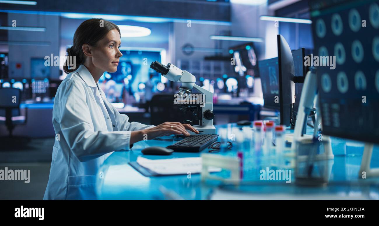 Medicine Development Laboratory: Caucasian Female Scientist Using ...