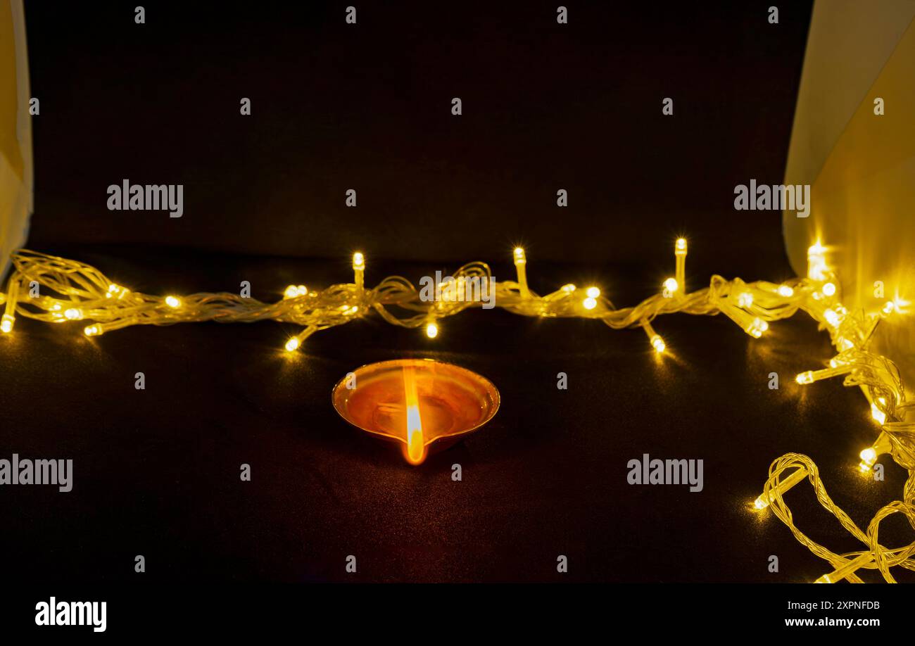 Diwali Lamps Diya with Christmas Lights in dark Night Tihar Dipawali ...
