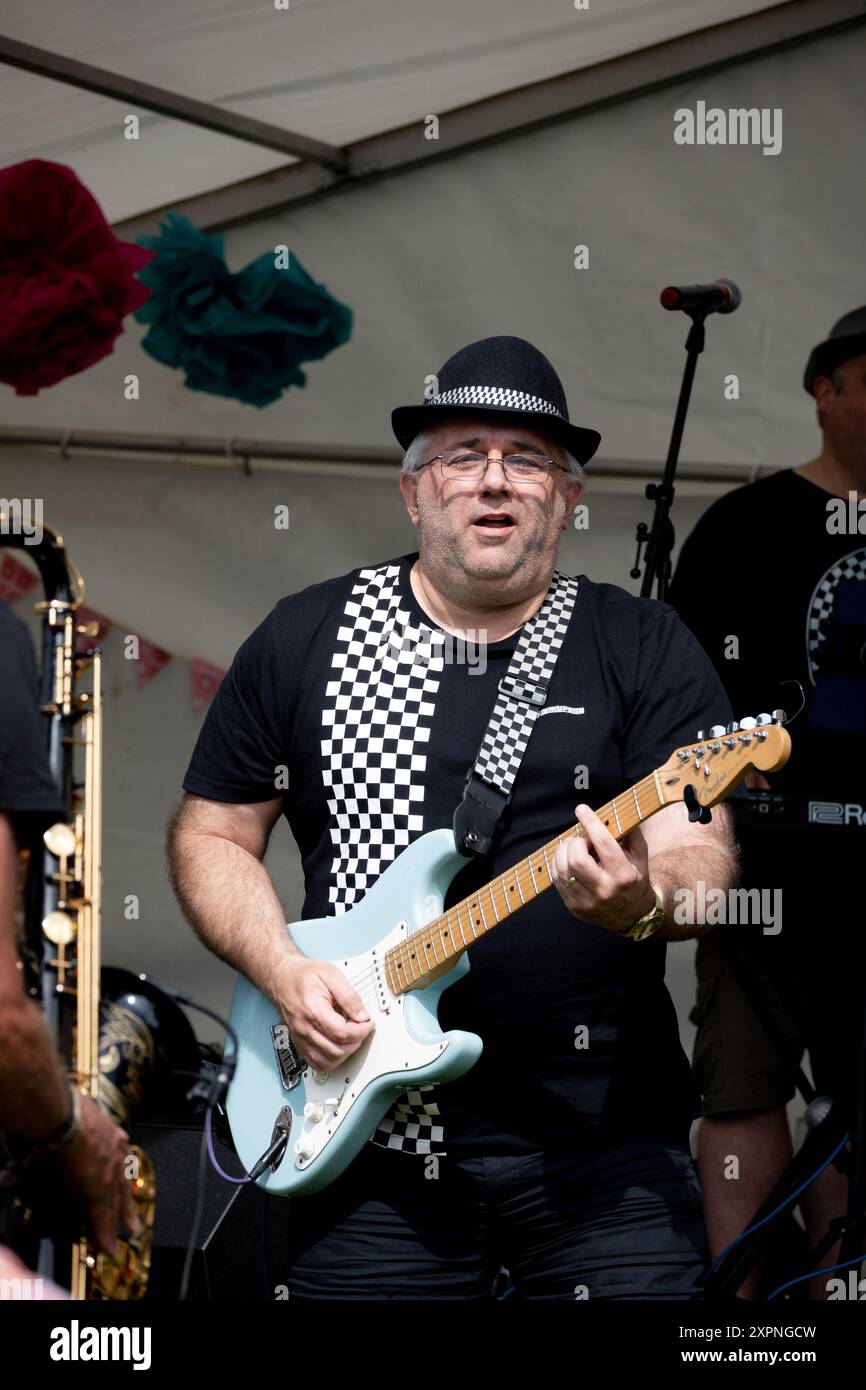 A guitarist in a Ska band Stock Photo - Alamy