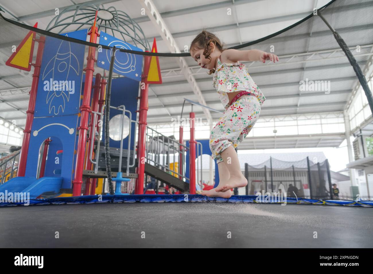 Happy kid having fun on playground in kindergarten Stock Photo - Alamy