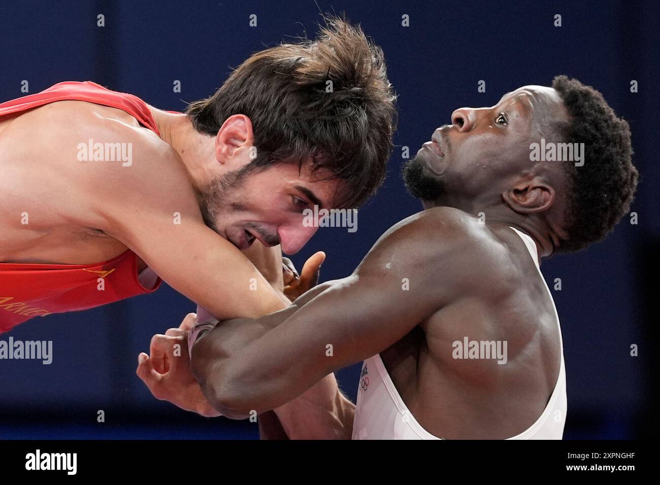 Armenia's Slavik Galstyan and France's Mamadassa Sylla, right, compete ...