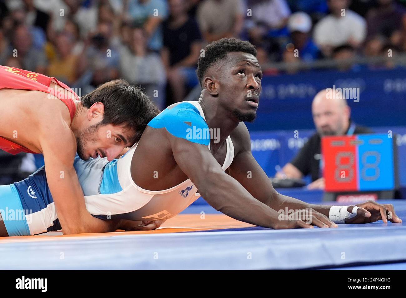 Armenia's Slavik Galstyan and France's Mamadassa Sylla, right, compete ...