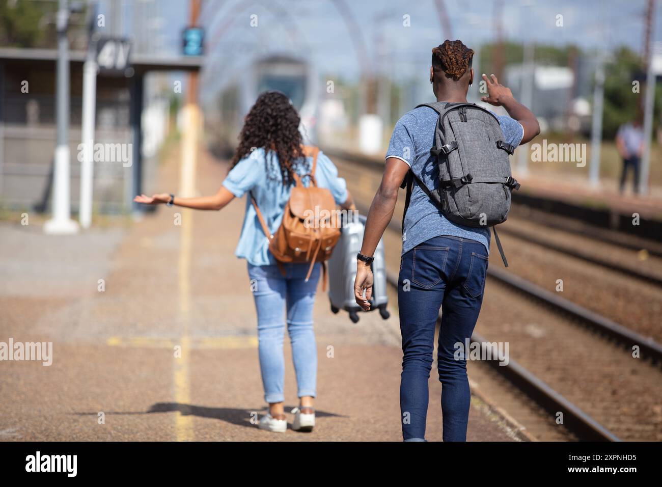 People greeting on train hi-res stock photography and images - Alamy