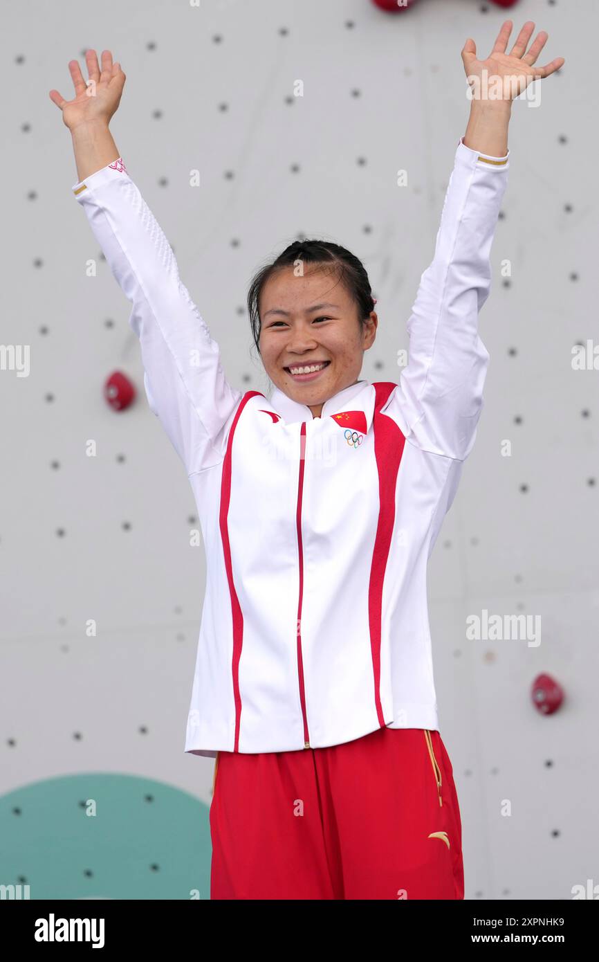Silver medallist Deng Lijuan of China celebrates on the podium after ...