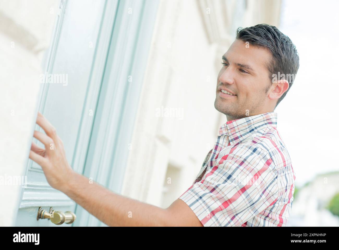 Pressing a door bell hi-res stock photography and images - Alamy