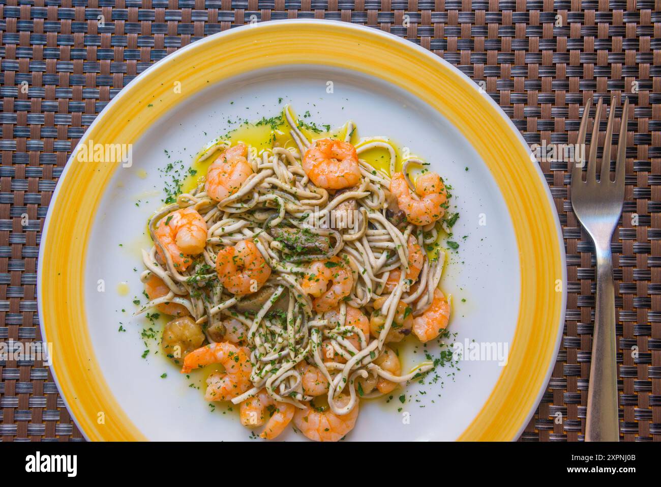 Gulas with prawns and mushroom. Spain Stock Photo - Alamy
