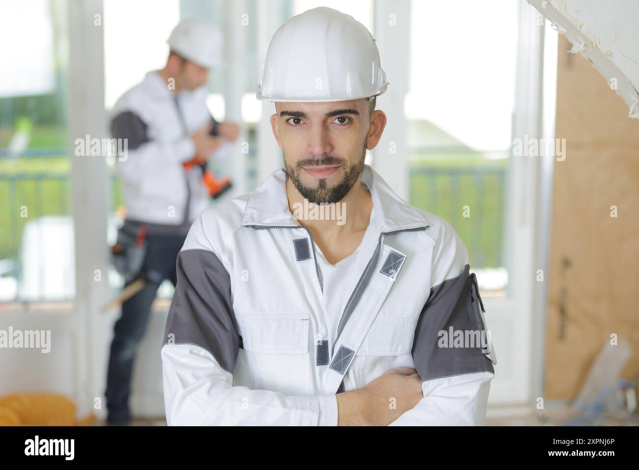 Portrait of male construction worker Stock Photo - Alamy
