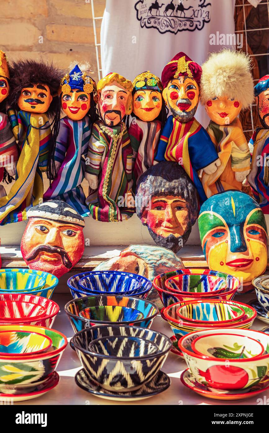 Papier-mache dolls and ceramics at a street bazaar in Ichan Kala, Khiva ...