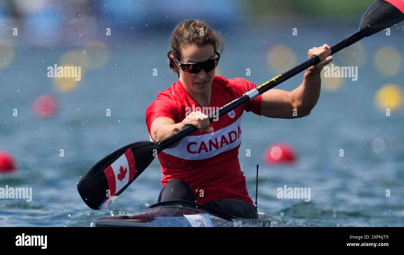 Michelle Russell, of Canada, competes in the women's kayak single 500 ...