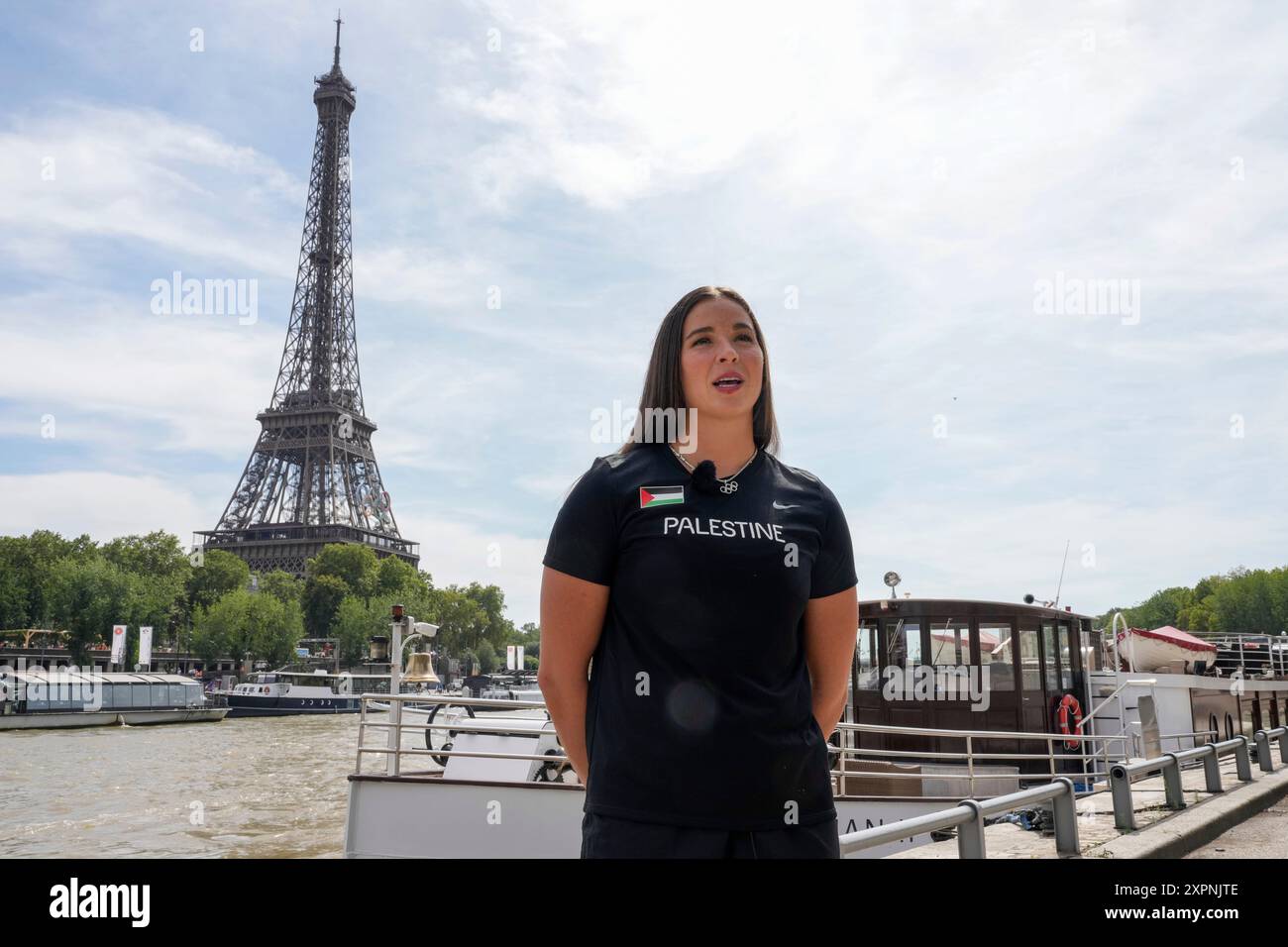 Palestinian-American swimmer Valerie Rose Tarazi speaks during an ...