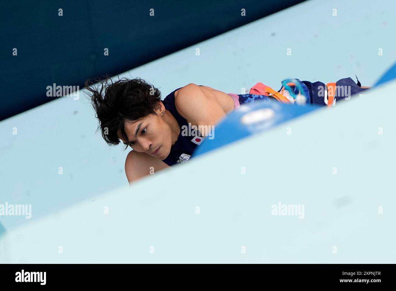 Tomoa Narasaki of Japan competes in the men's boulder and lead, semi ...