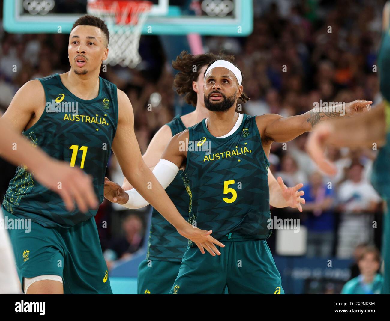 Paris, FRANCE - AUGUST 06: Patty Mills of Australia , Dante Exum of ...