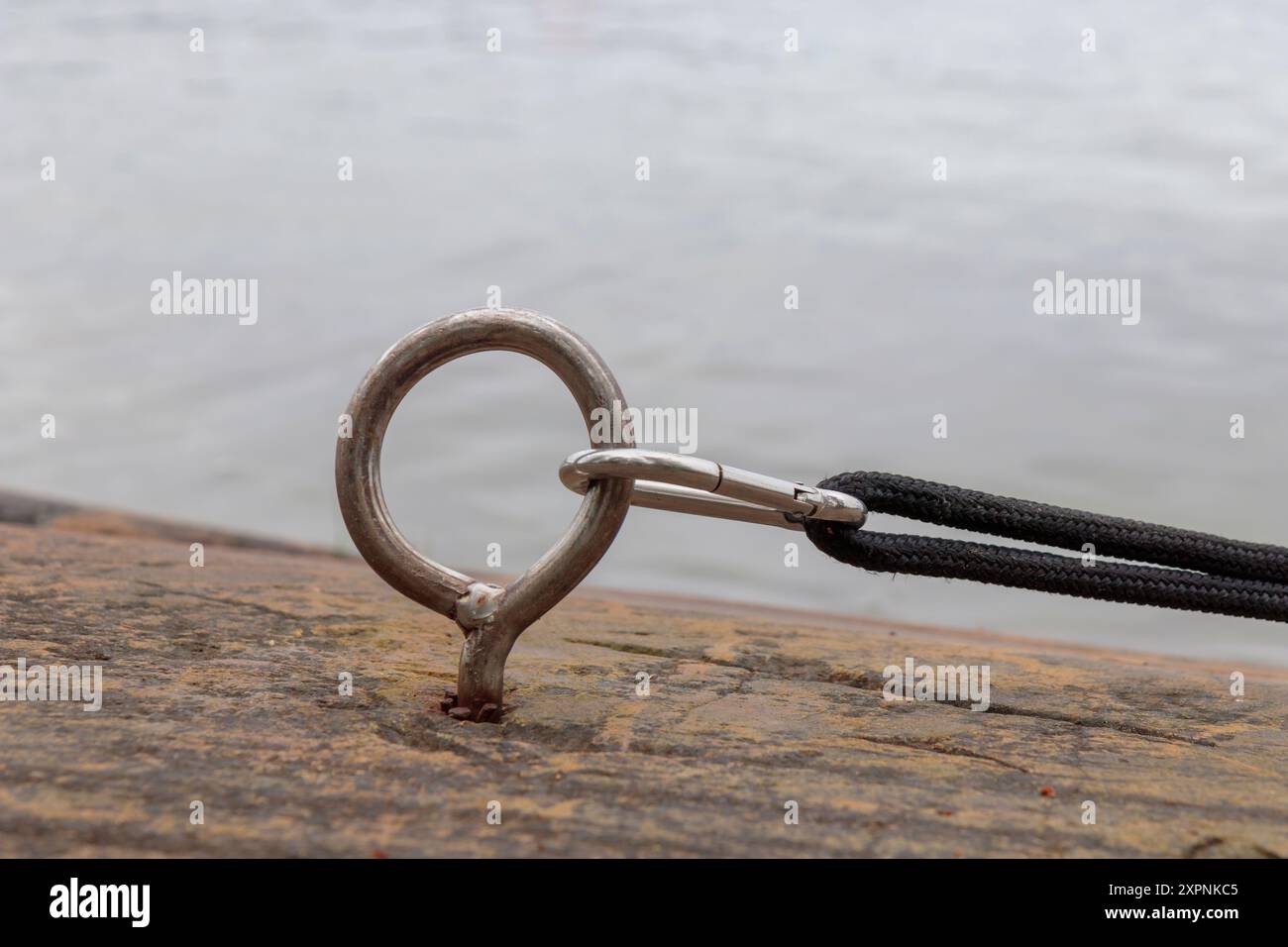 Mooring ring for boats in the stone with carbine and black rope from ...