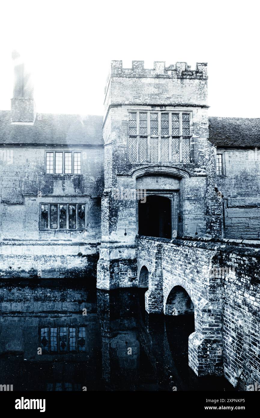 The entrance bridge to an English historic moated manor house Stock ...