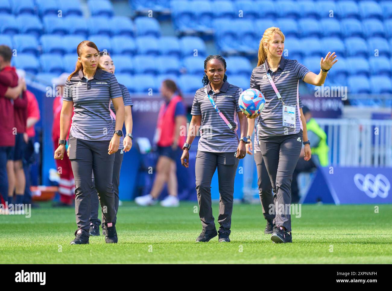 referee Bouchra Karboubi (MAR) with whistle, gestures, shows, watch ...