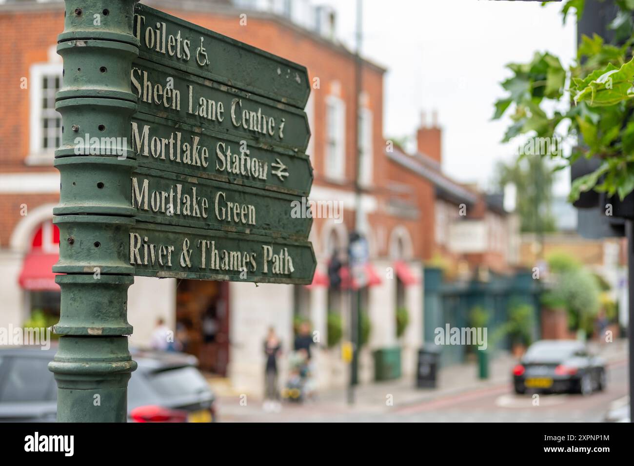 LONDON- JULY, 2024: Directional local signage for pedestrians in ...