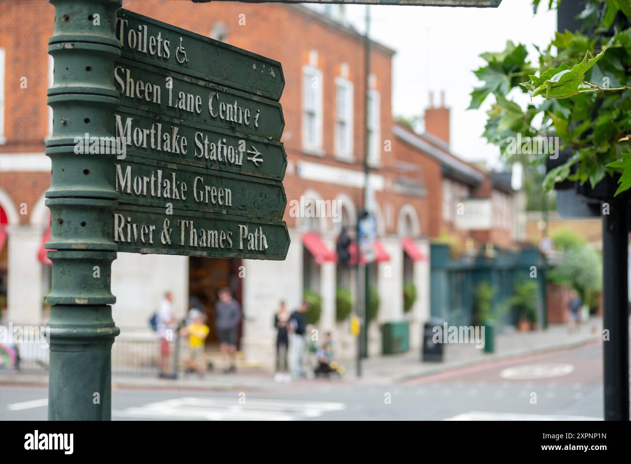 LONDON- JULY, 2024: Directional local signage for pedestrians in ...